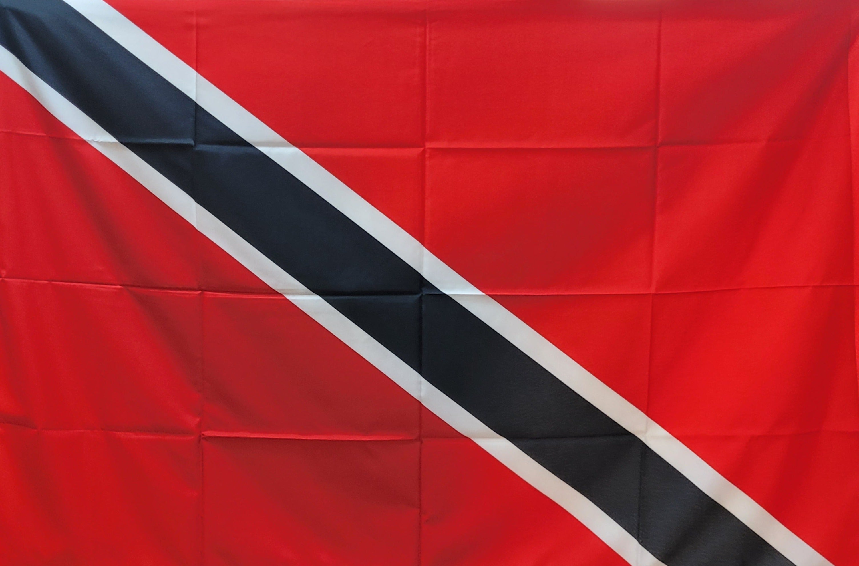 Bandiera trinidadiana del Trinidad e Tobago – Il Distintivo Pesaro